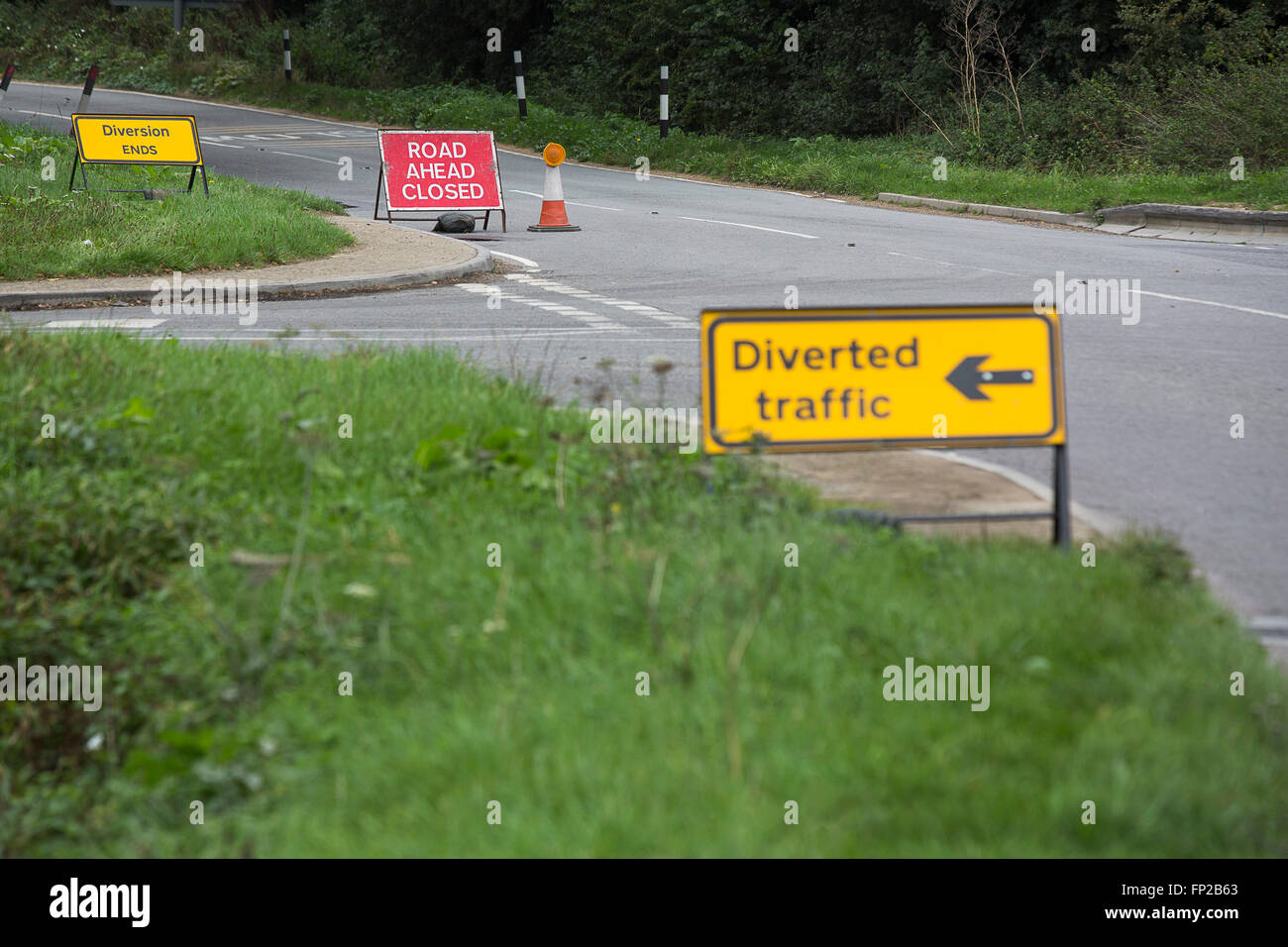 Road signs on a country lane showing diverted traffic and closed roads ...
