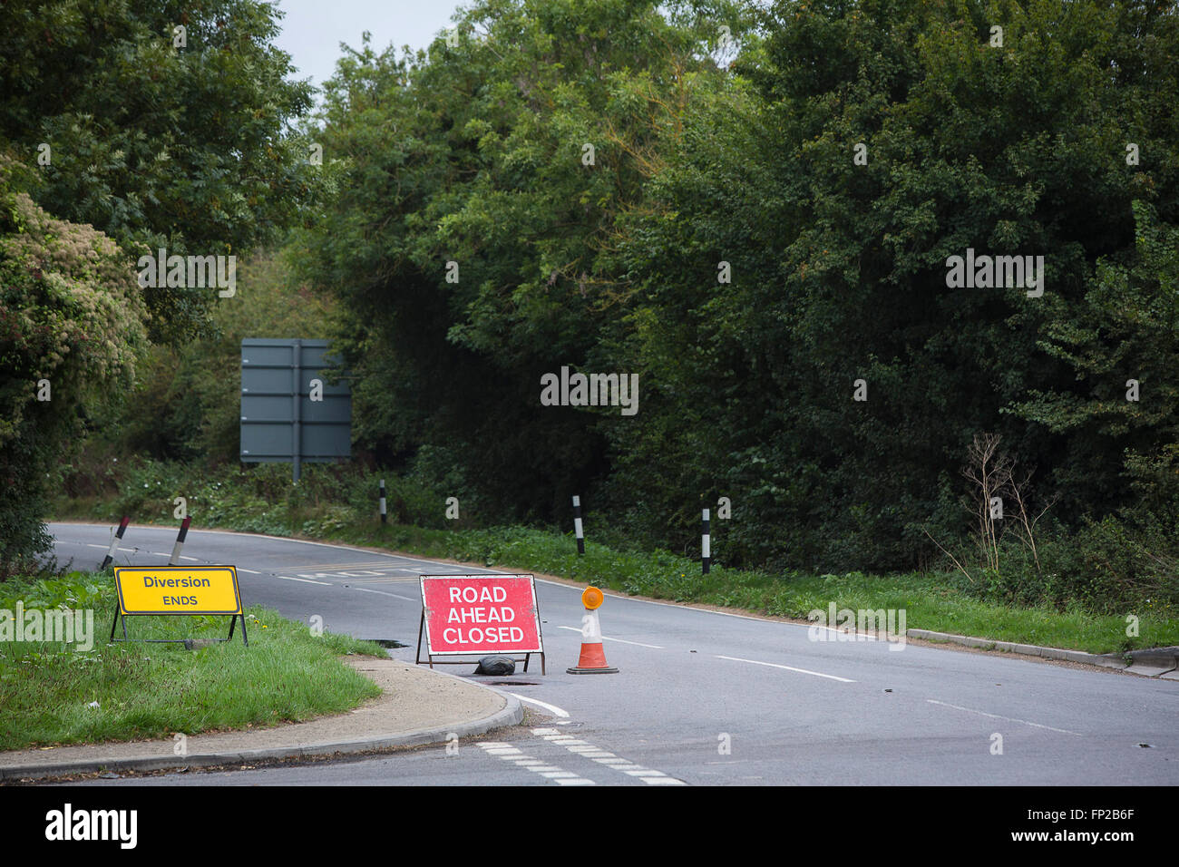 Road signs on a country lane showing diverted traffic and closed roads ...