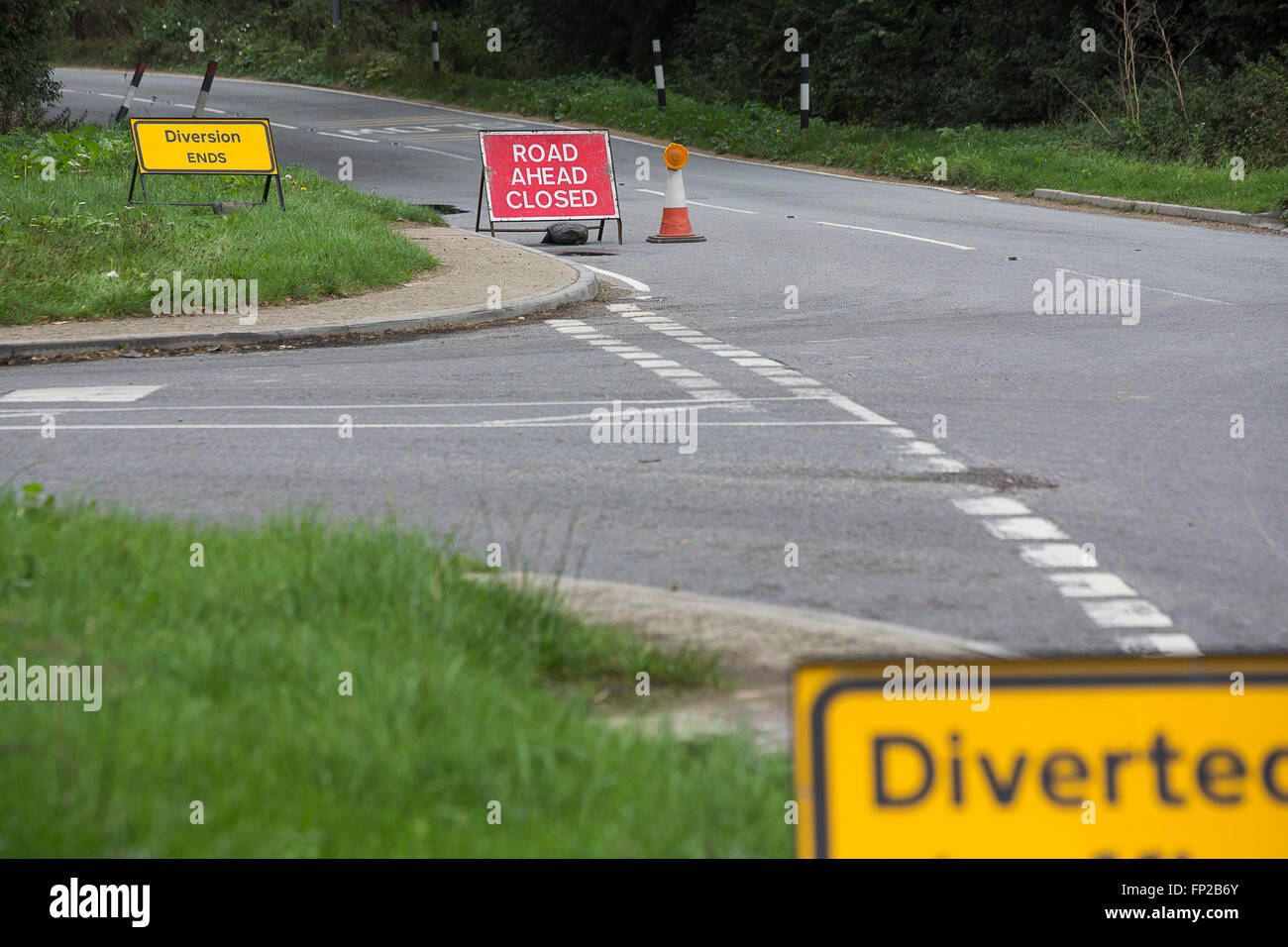 Road signs on a country lane showing diverted traffic and closed roads ...