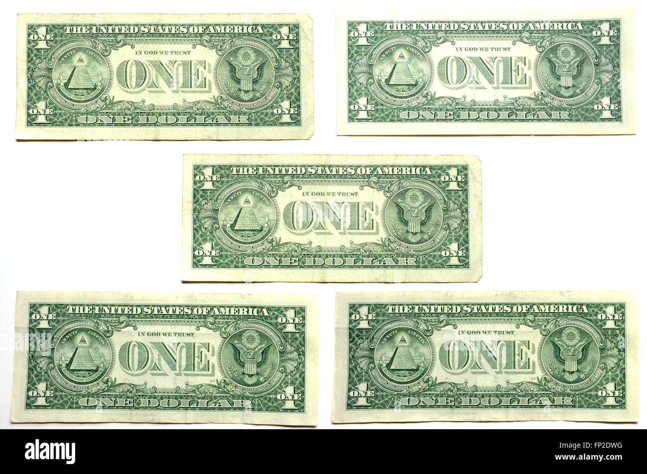 Five American One Dollar notes photographed against a white background ...
