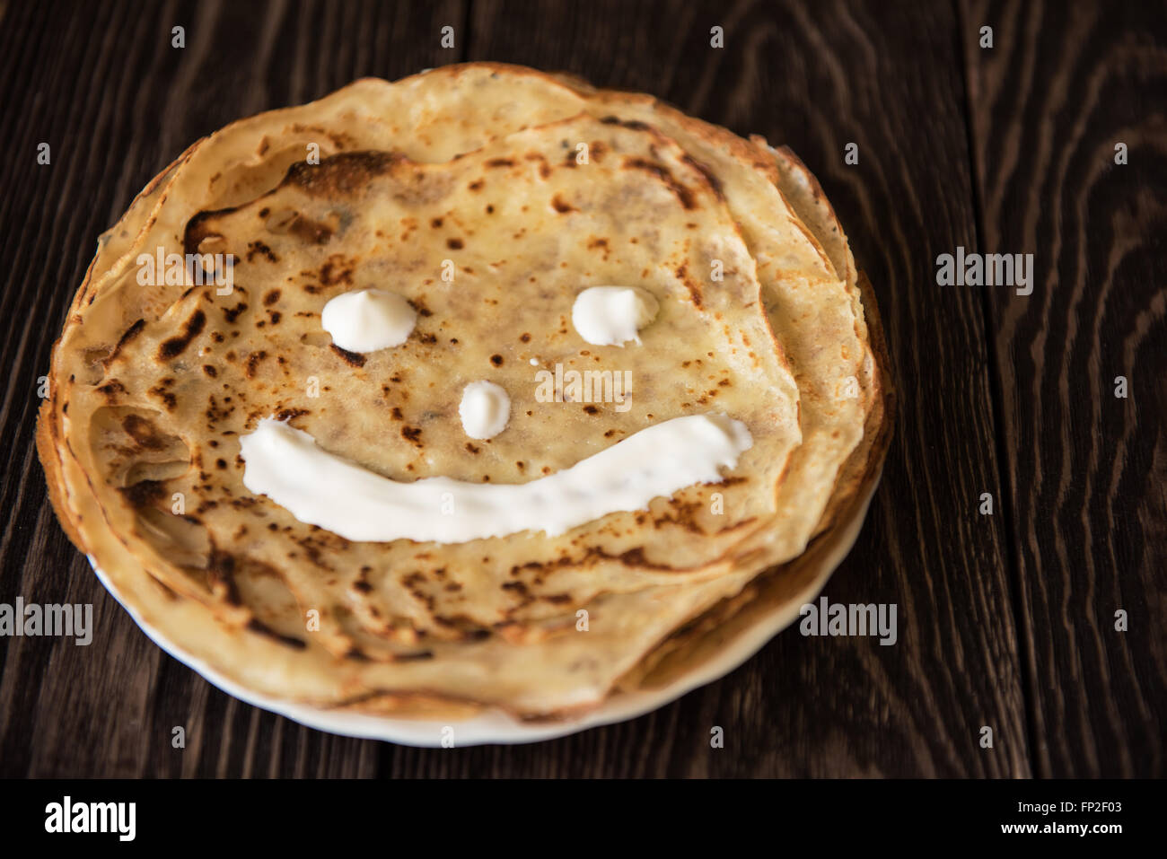 Fried tasty smiling pancakes Stock Photo - Alamy