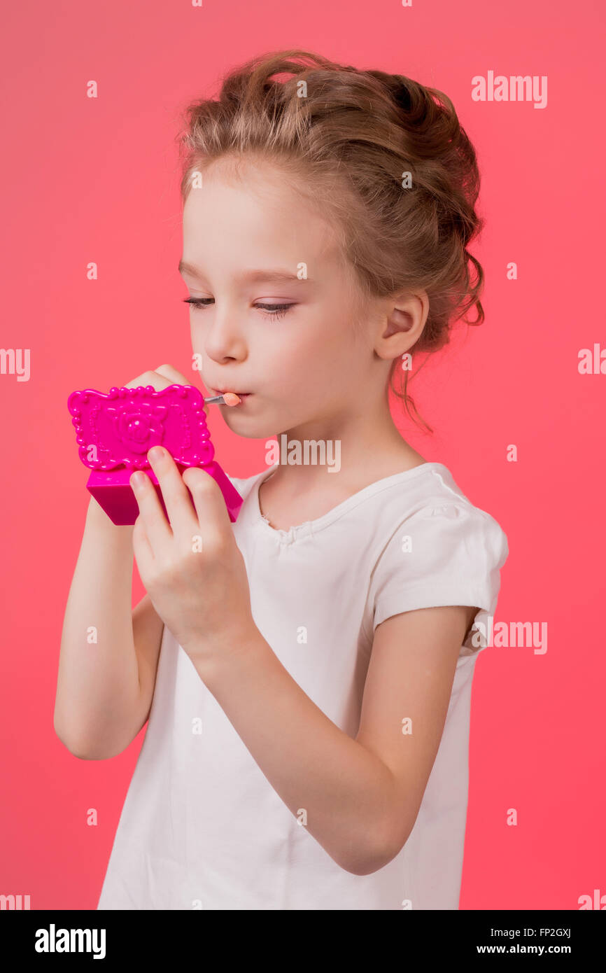 Makeup teen girl. Cute cosmetics woman having fun with make-up products ...