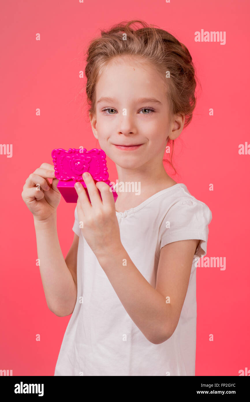 Makeup teen girl. Cute cosmetics woman having fun with make-up products ...