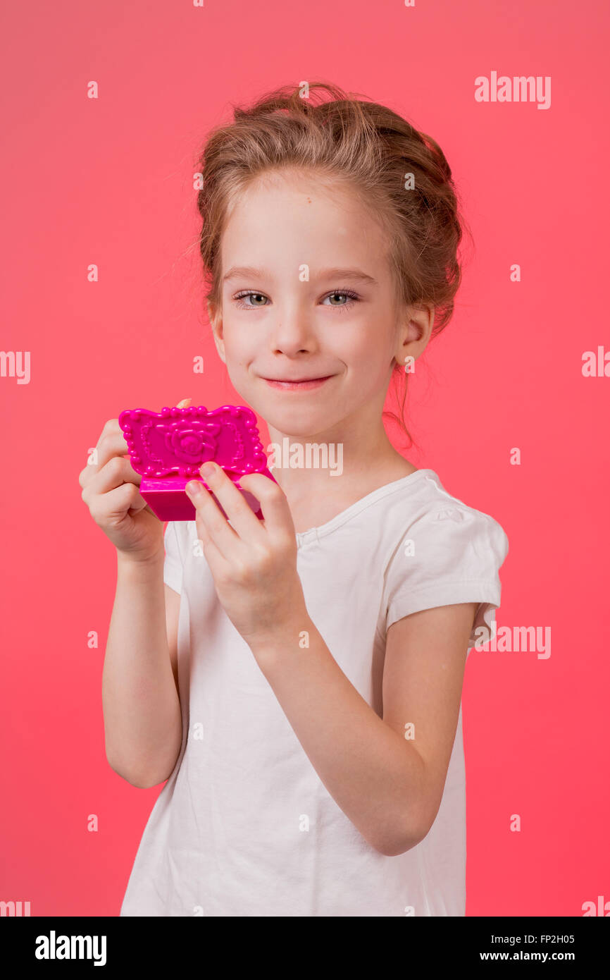 Makeup teen girl. Cute cosmetics woman having fun with make-up products ...