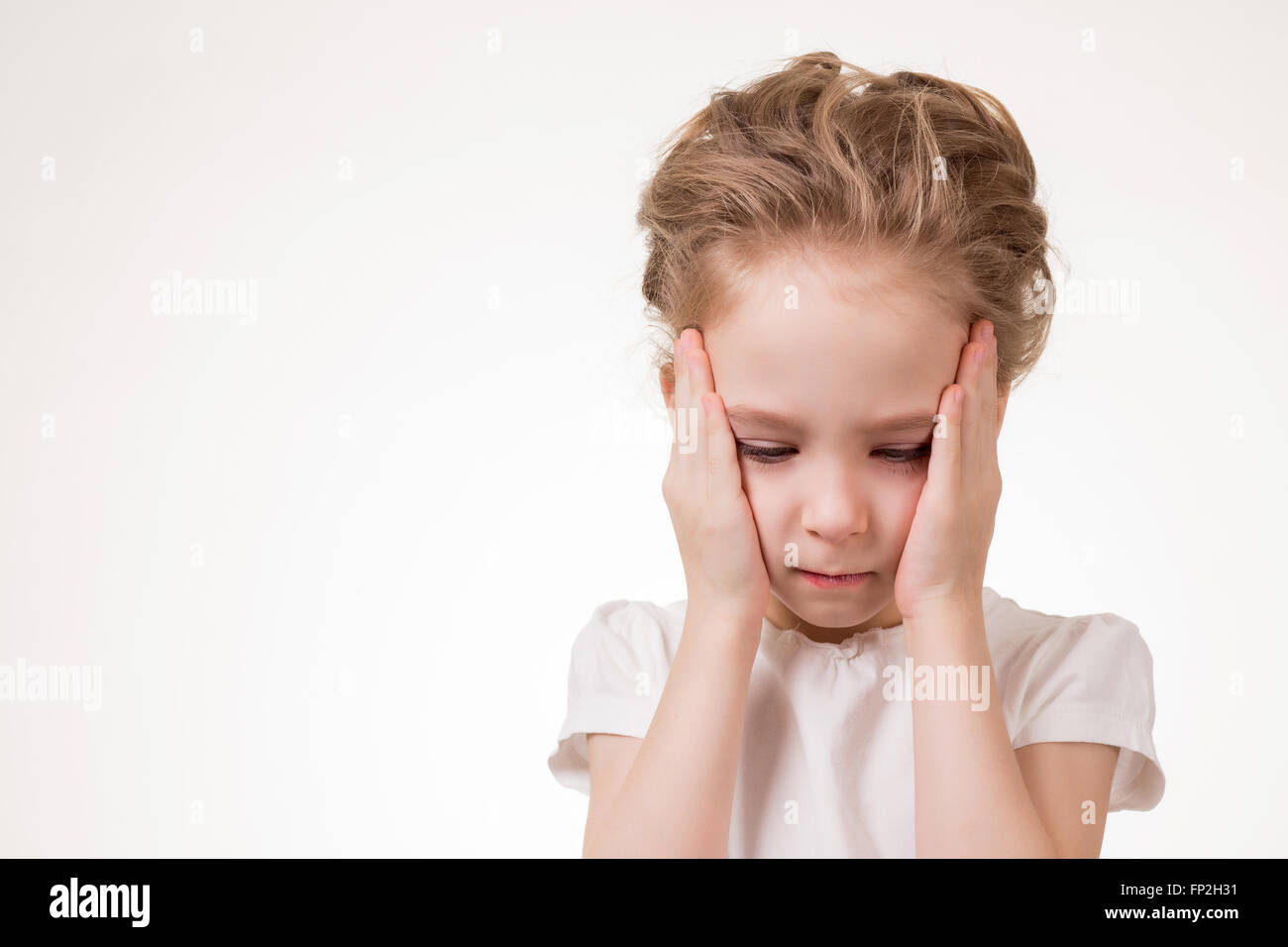 Young girl very frustrated isolated on white background Stock Photo - Alamy