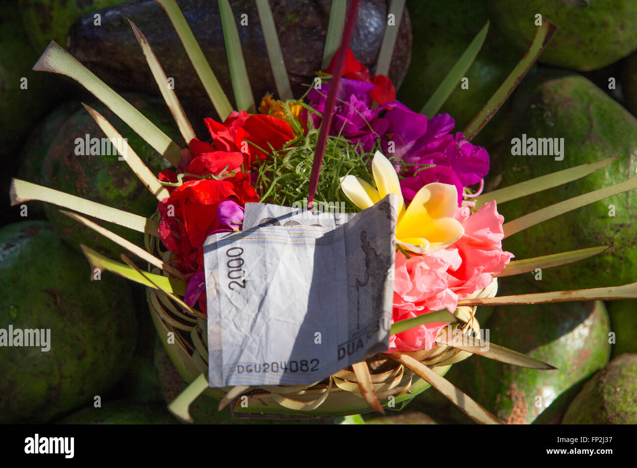 Asia, Indonesia, Bali. Outdoor Bali flower market. Flowers are used ...