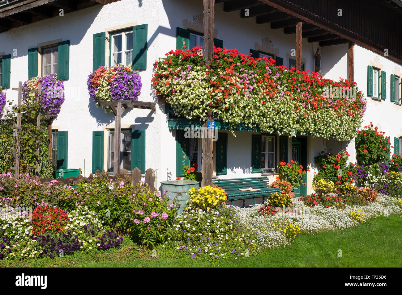 Farmhouse with flower-boxes in Beuerberg, Eurasburg, Upper Bavaria ...