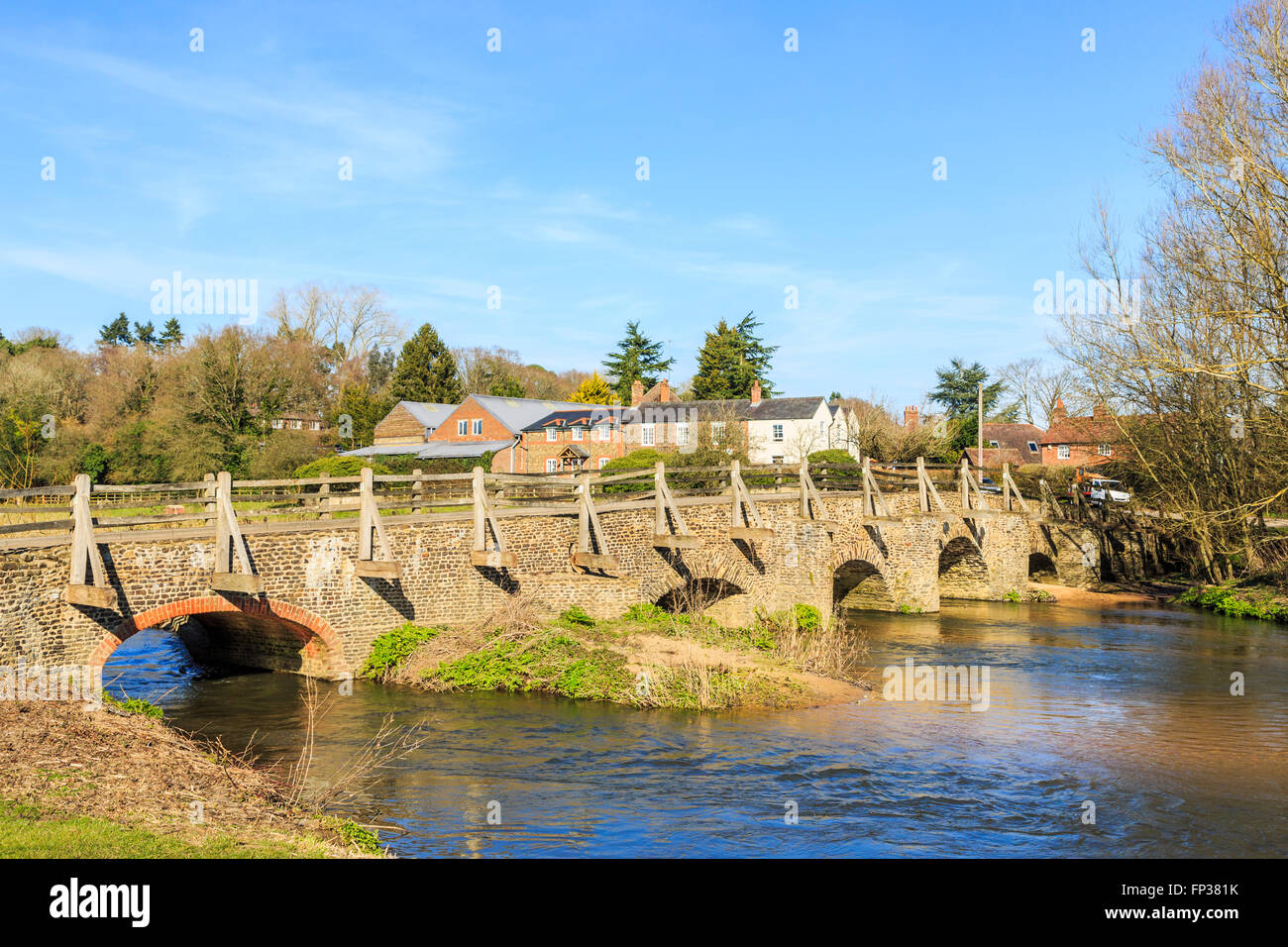 Medieval bridge over the River Wey, a scheduled monument in the small ...