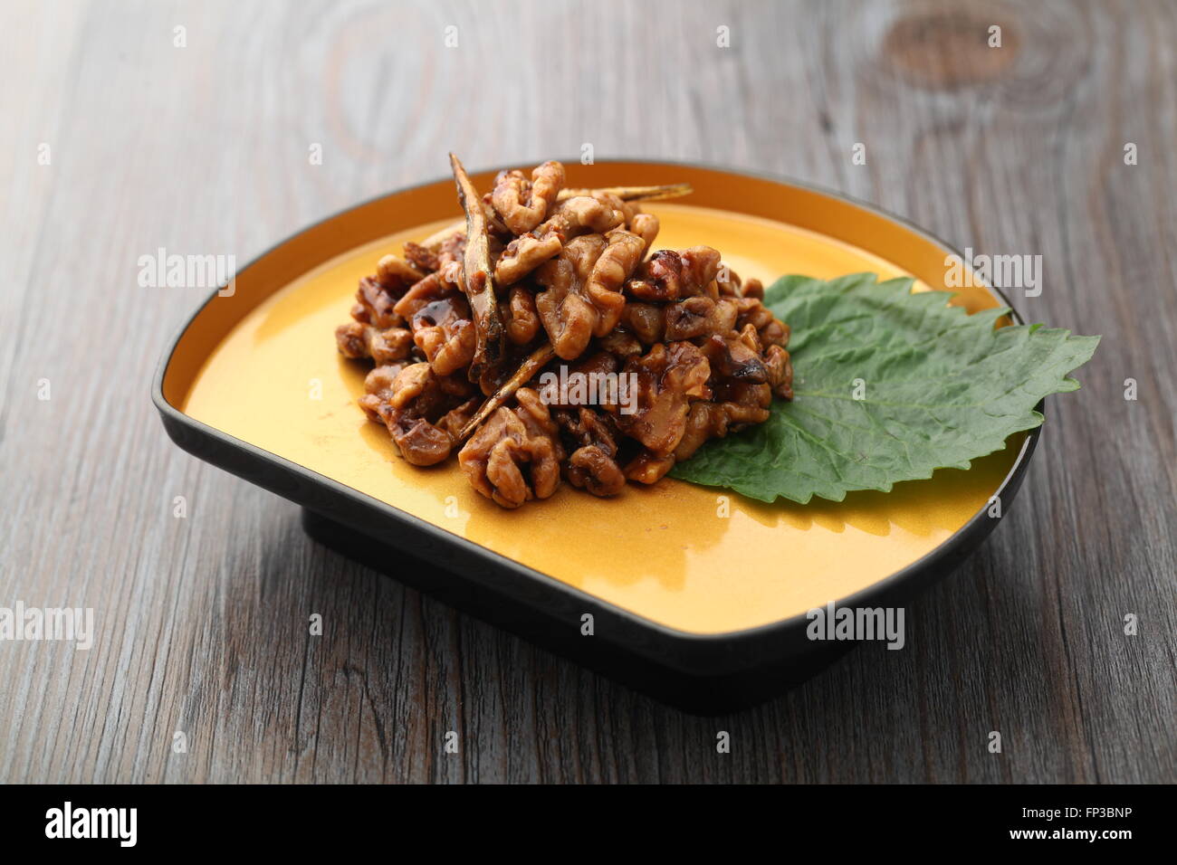 fried fish with walnut Stock Photo - Alamy