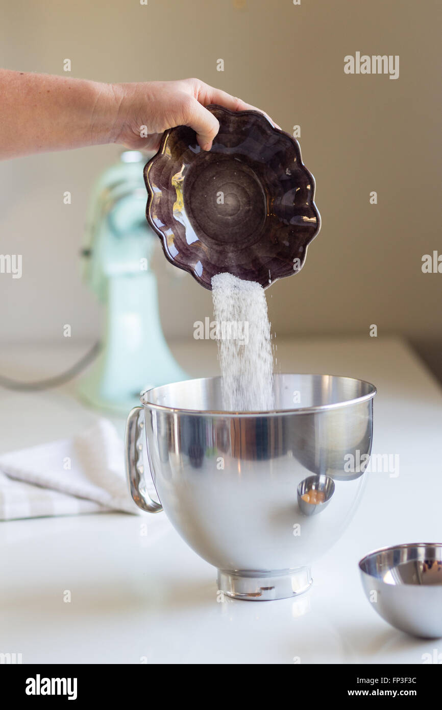Woman pouring sugar in hi-res stock photography and images - Alamy