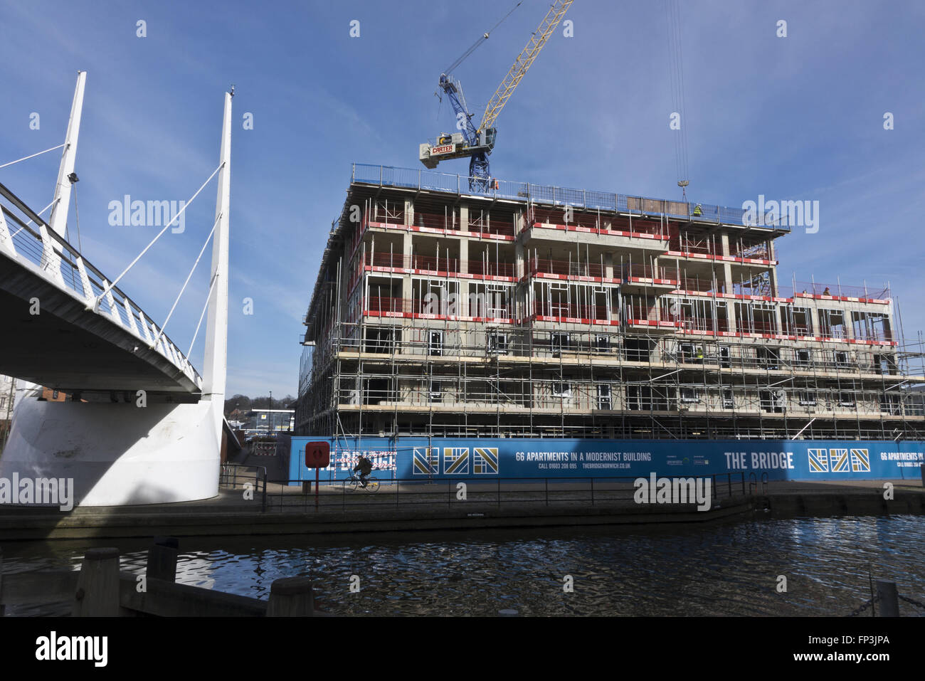 Construction site building riverside apartments flats Stock Photo - Alamy