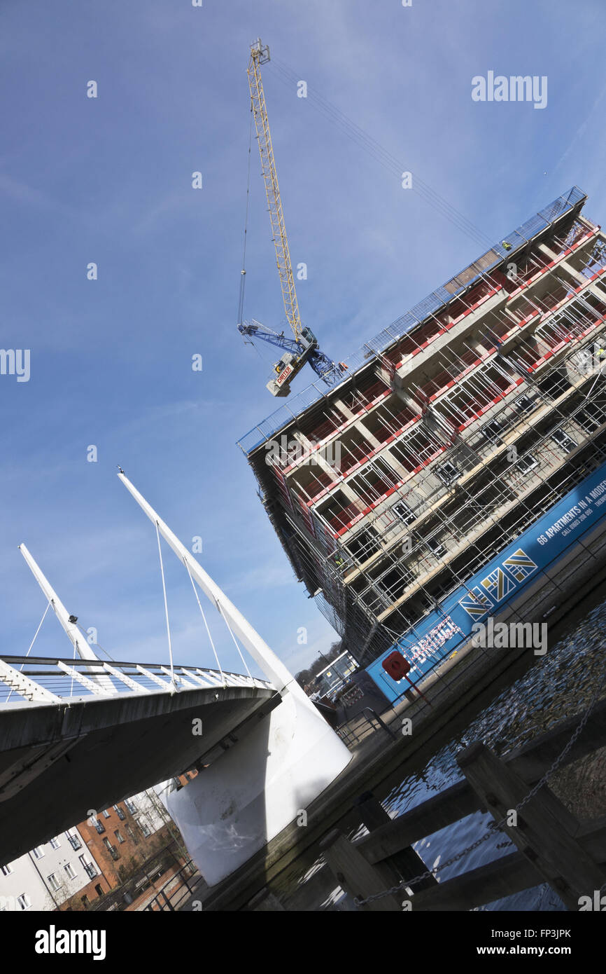 Construction site building riverside apartments flats Stock Photo - Alamy