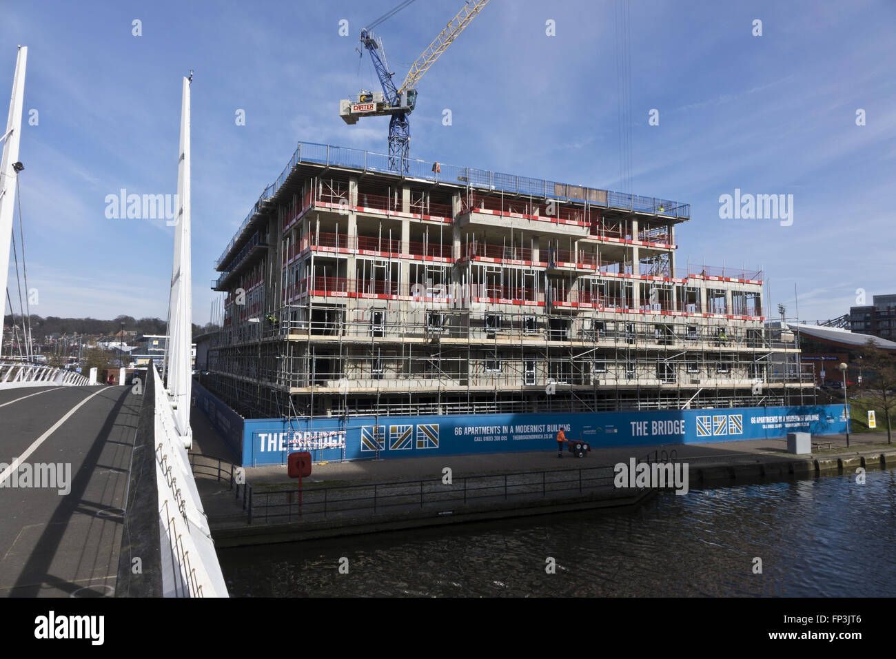 Construction site building riverside apartments flats Stock Photo - Alamy