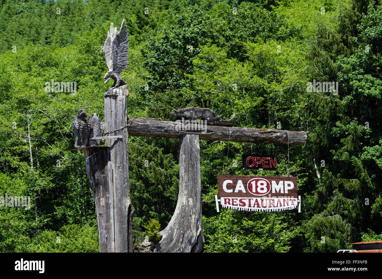 Sign and wooden sculpture at the Camp 18 restaurant in Elsie, Oregon ...