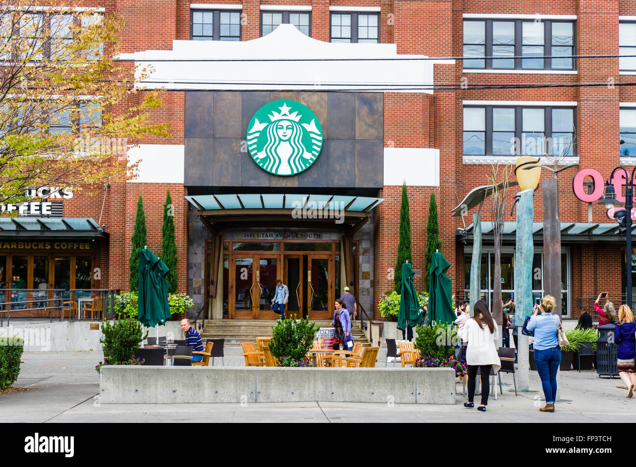 Shoppers outside the Starbucks Corporation headquarters building in ...