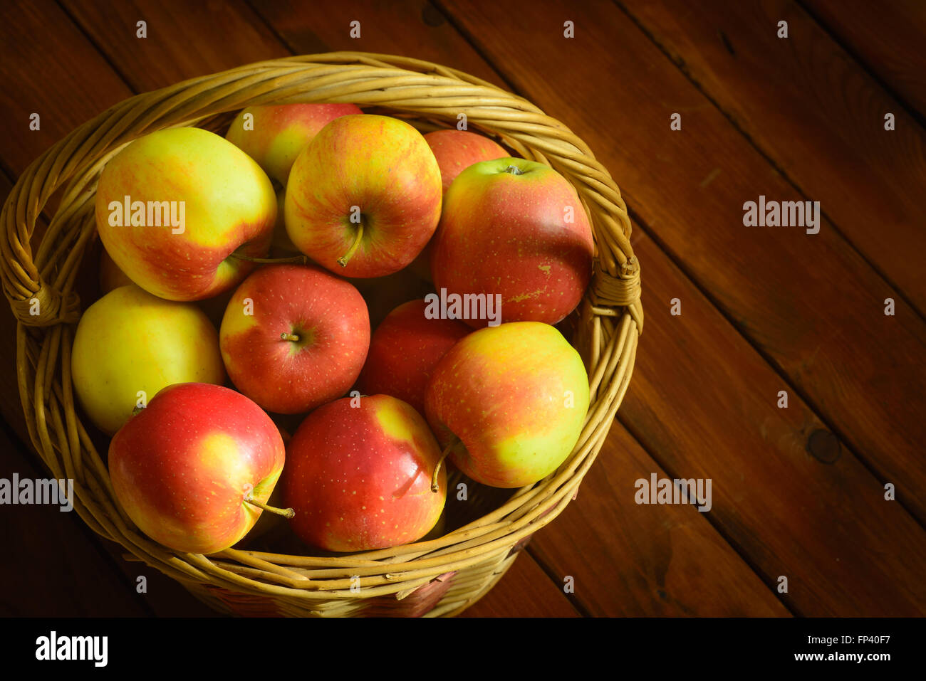 group of ripe apples in basket Stock Photo - Alamy