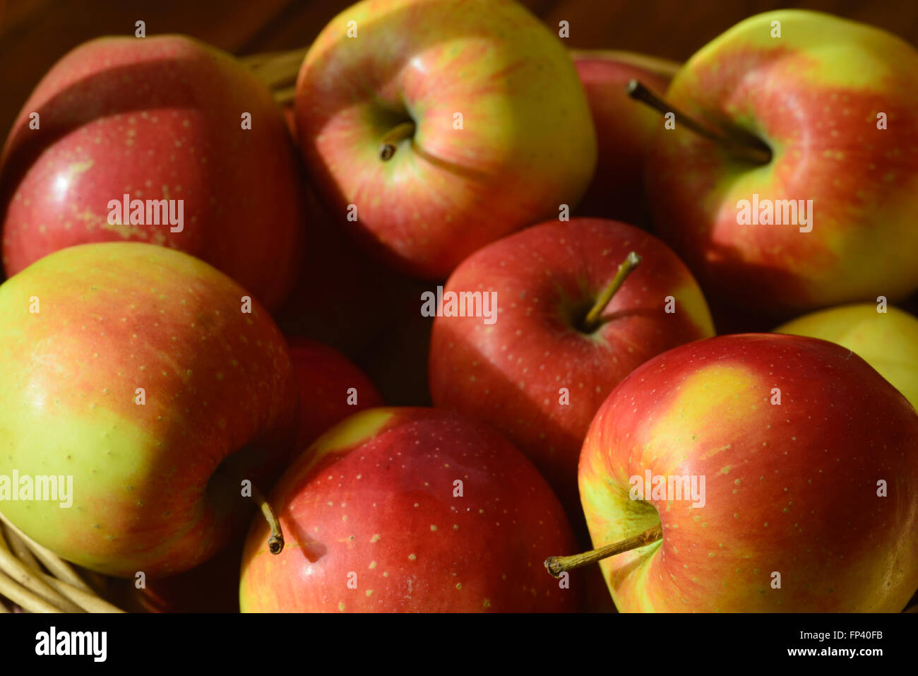 group of ripe apples in basket Stock Photo - Alamy
