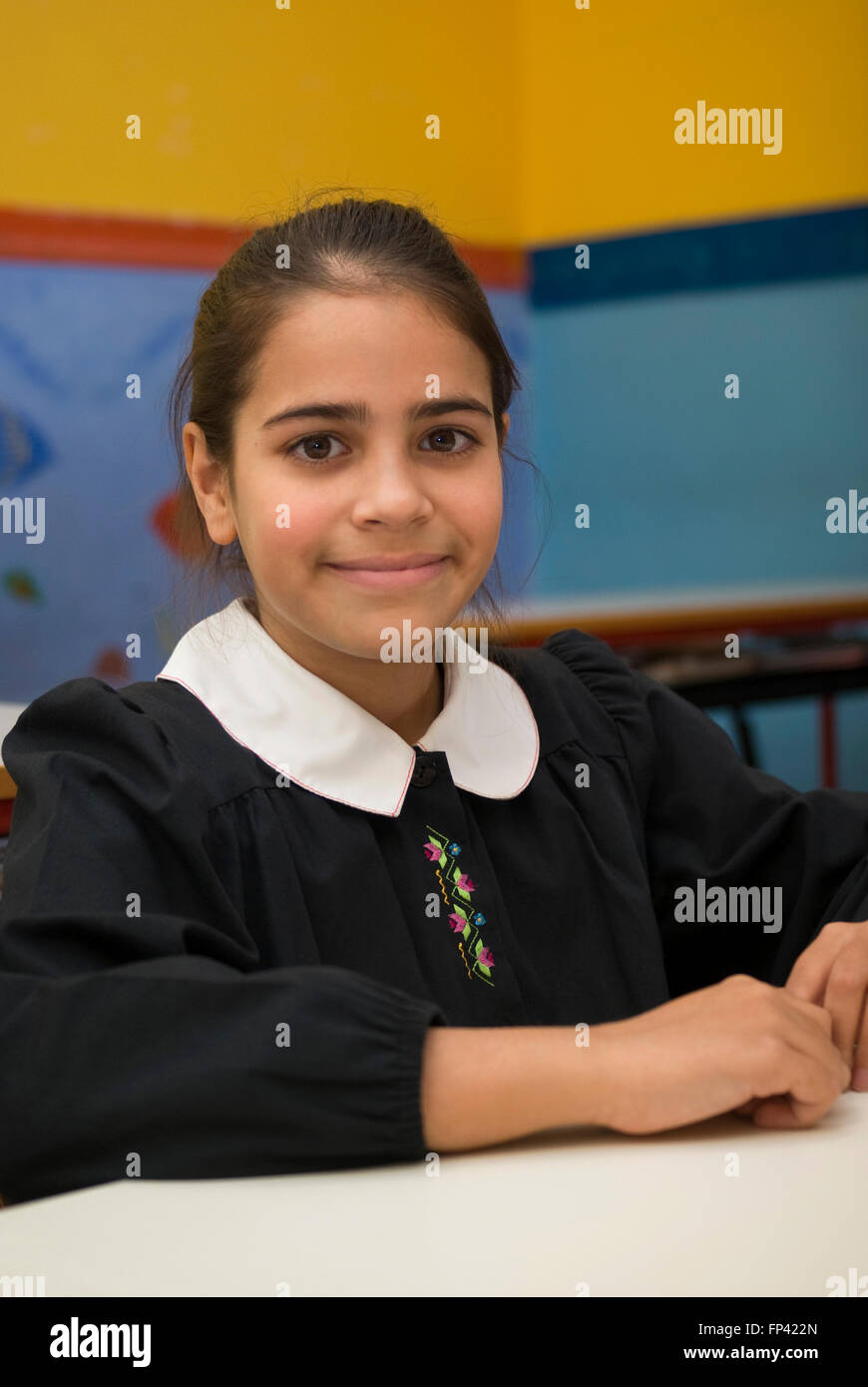 Elementary school student posing in uniform Stock Photo - Alamy