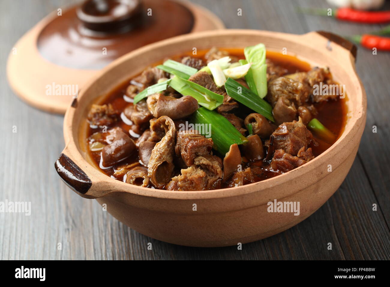 Chinese cuisine served in a claypot Stock Photo - Alamy