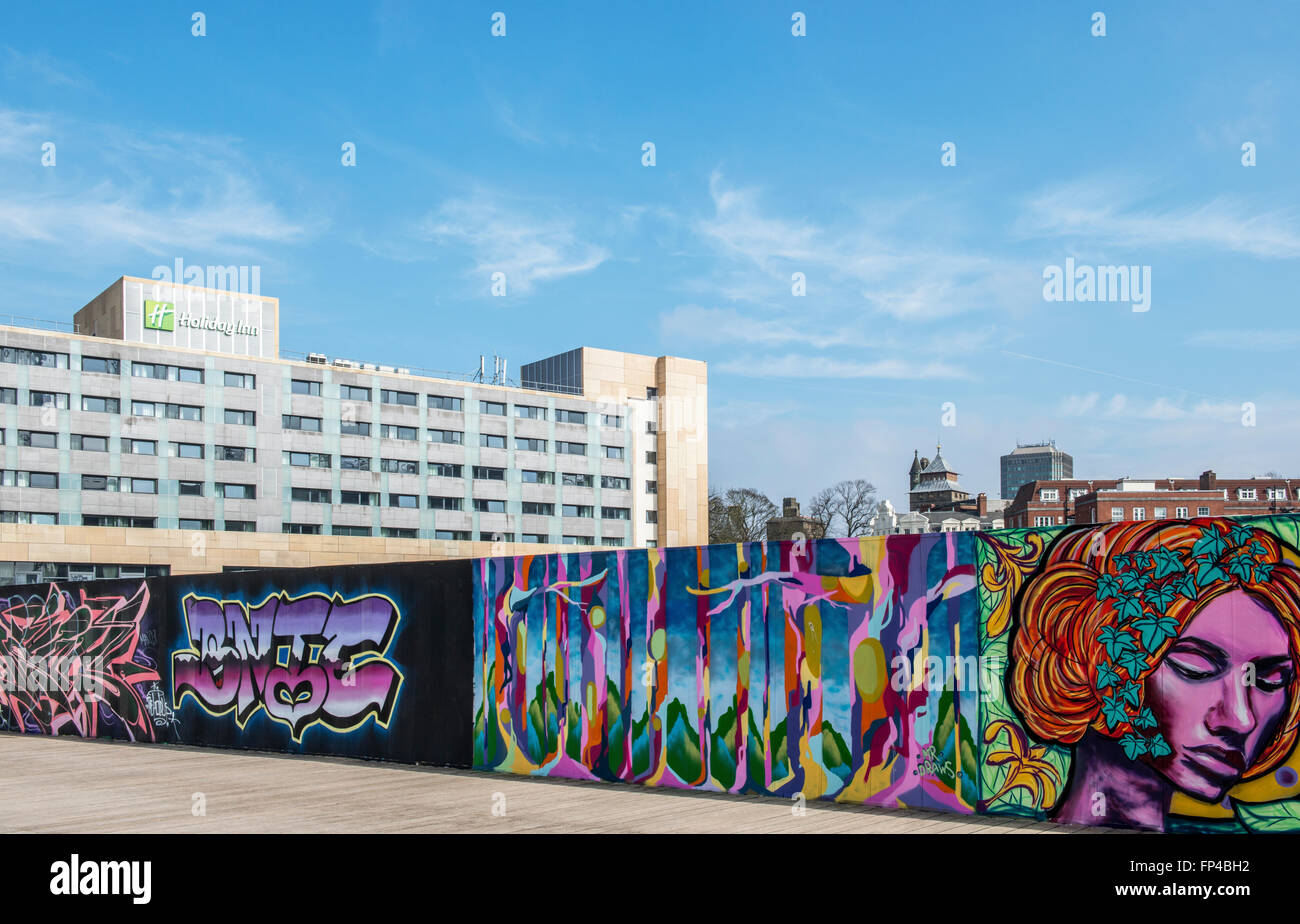 Riverside Graffiti Board in Cardiff, with the Holiday In behind Stock ...