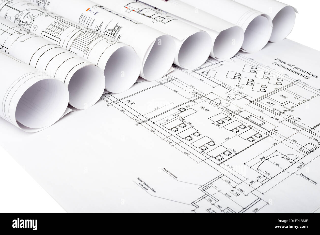 Architecture plan and rolls of blueprints, side view. Building concept ...