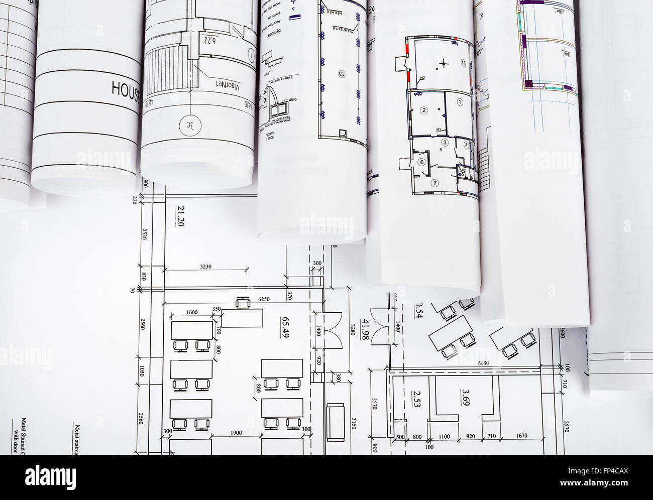 Blueprints and rolls of blueprints, top view. Building concept Stock ...