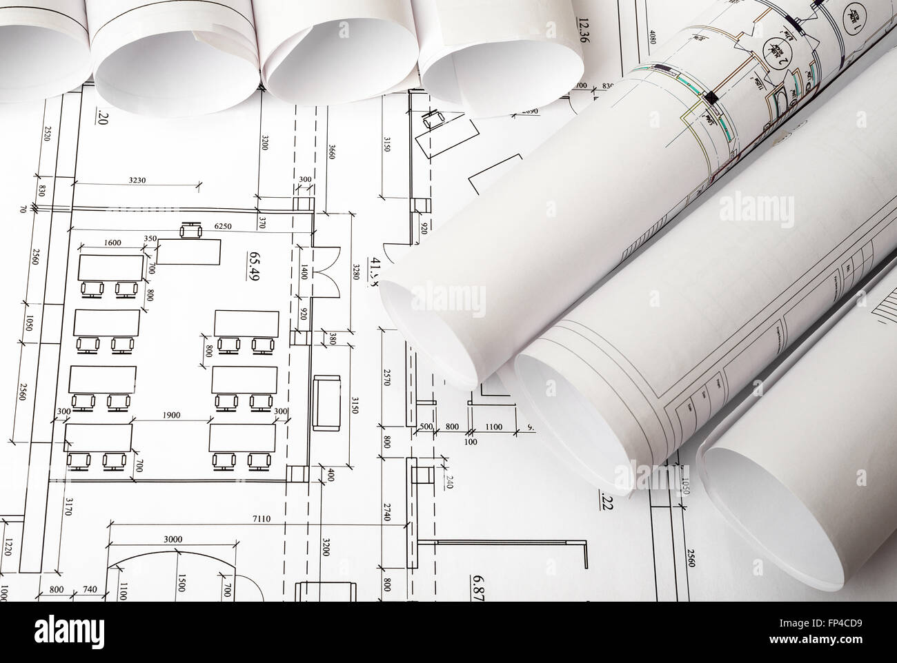 Blueprints and rolls of blueprints, top view. Building concept Stock ...