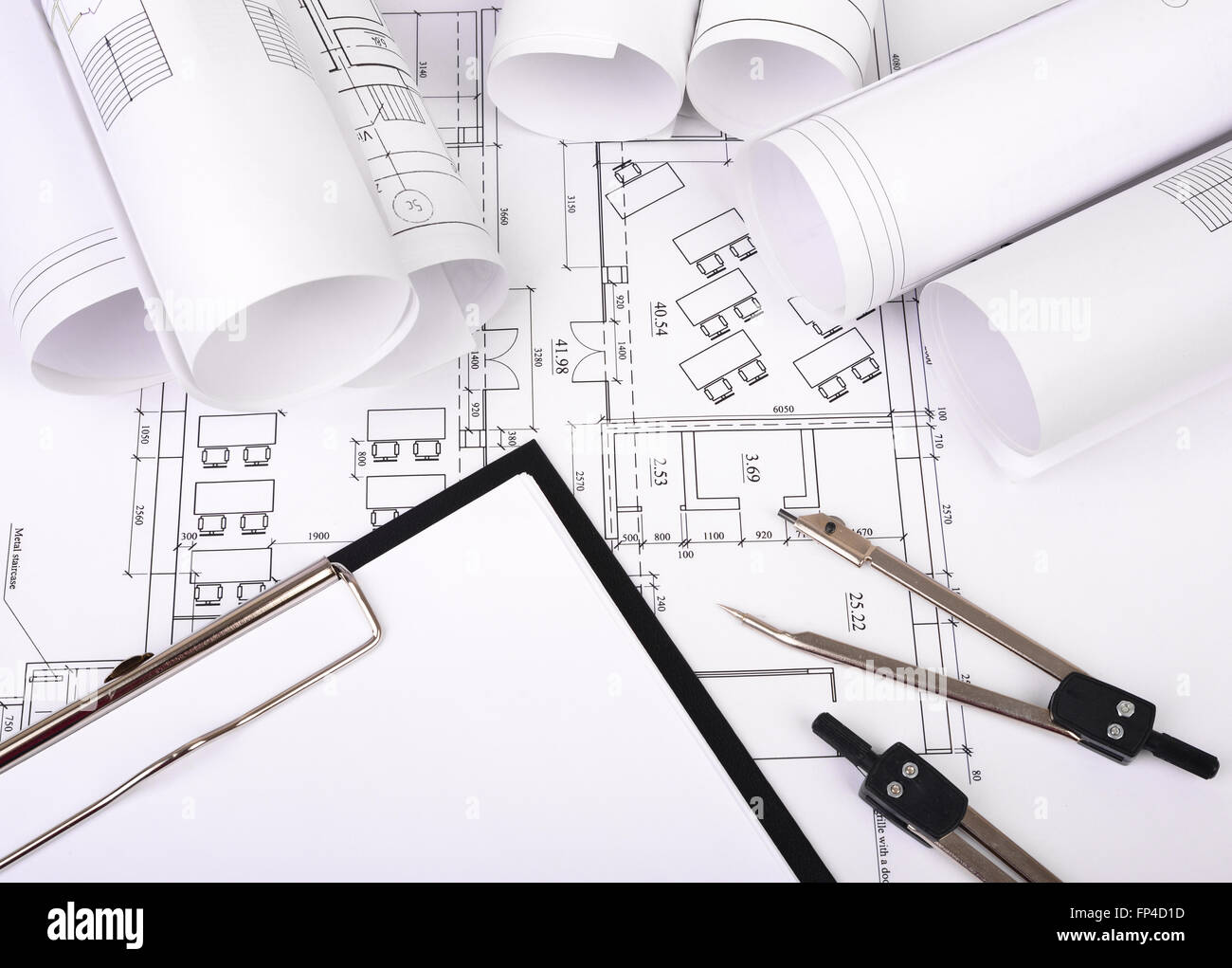 Rolls of blueprints with dividers and folder. Building concept Stock ...