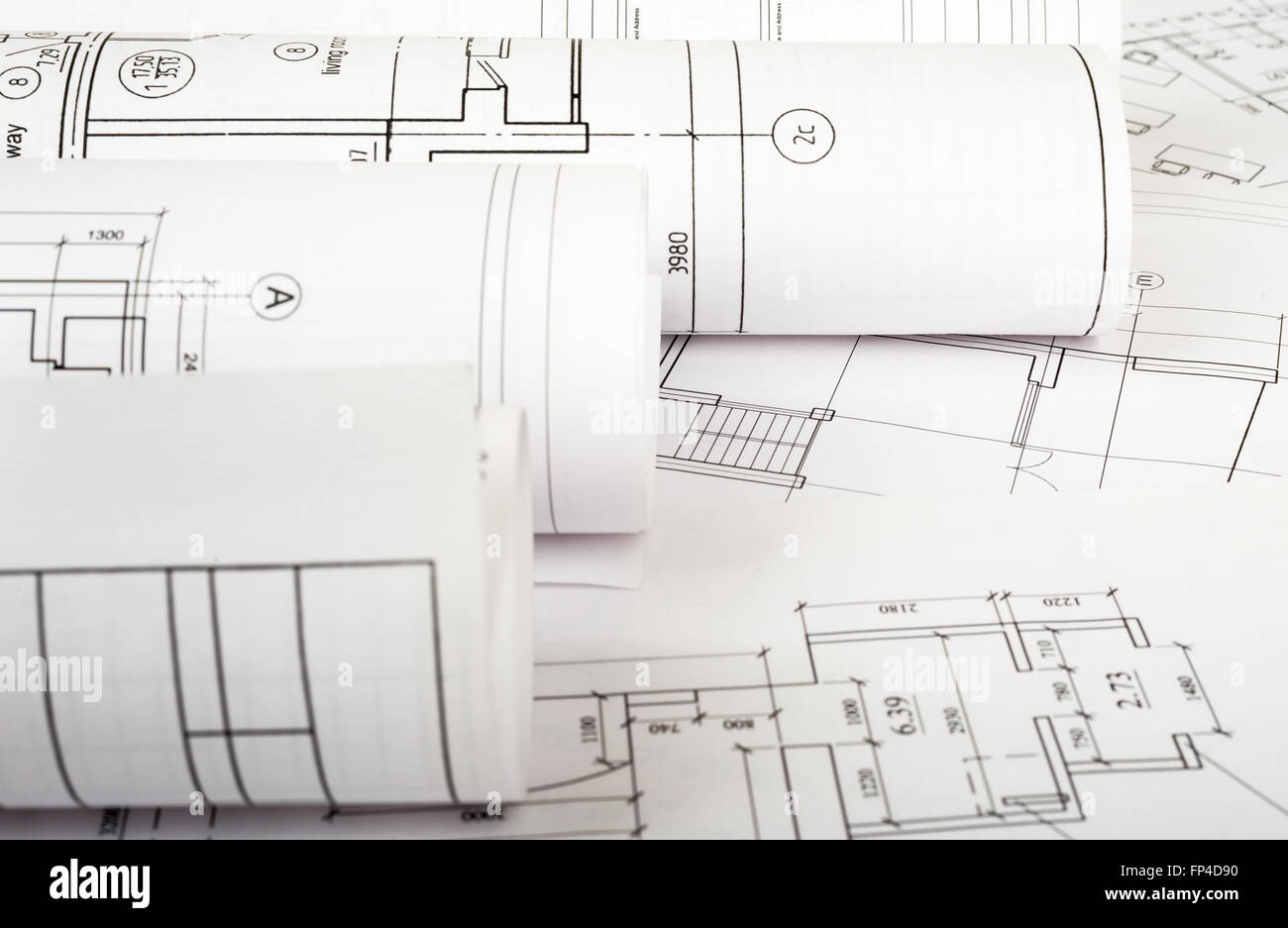 Architecture plan and rolls of blueprints closeup. Building concept ...
