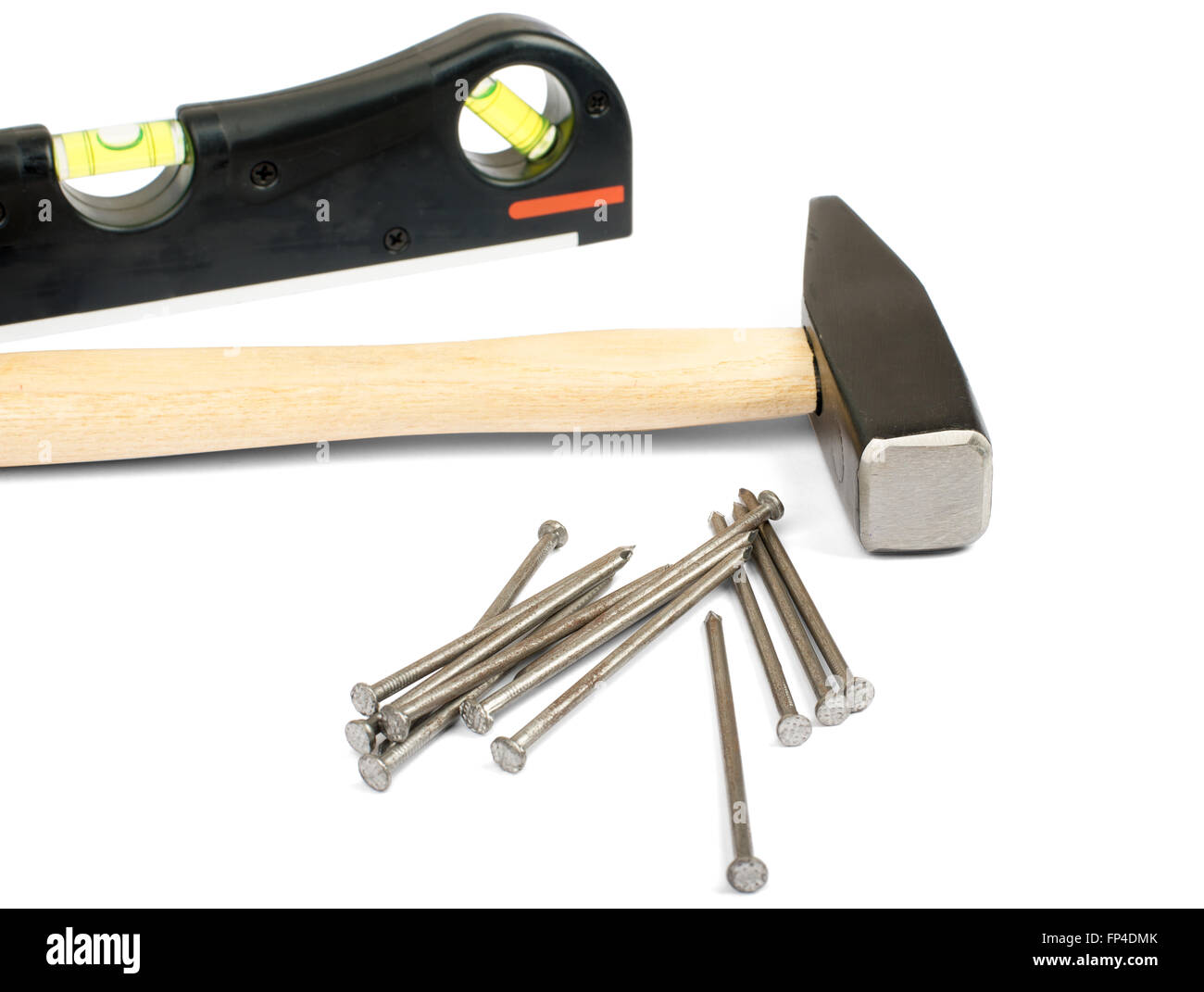 New hammer with nails and level isolated on white background Stock ...
