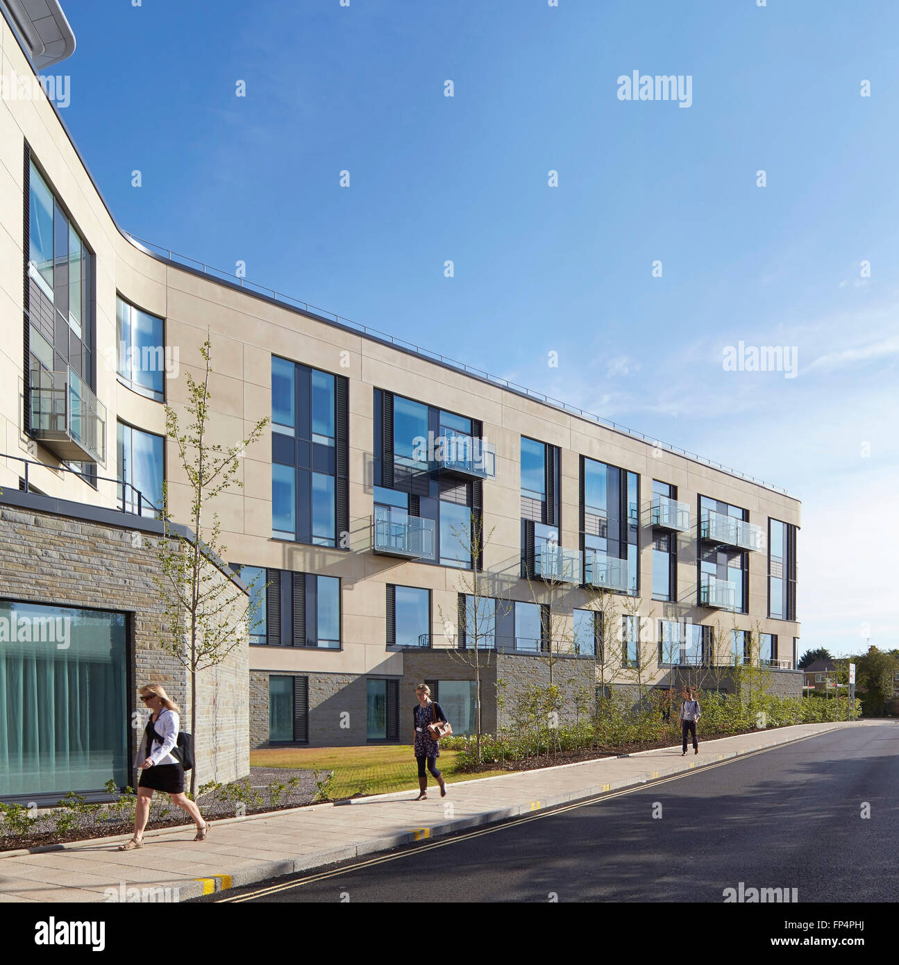Walkway along sunlit facade. Southmead Hospital, Bristol, United ...