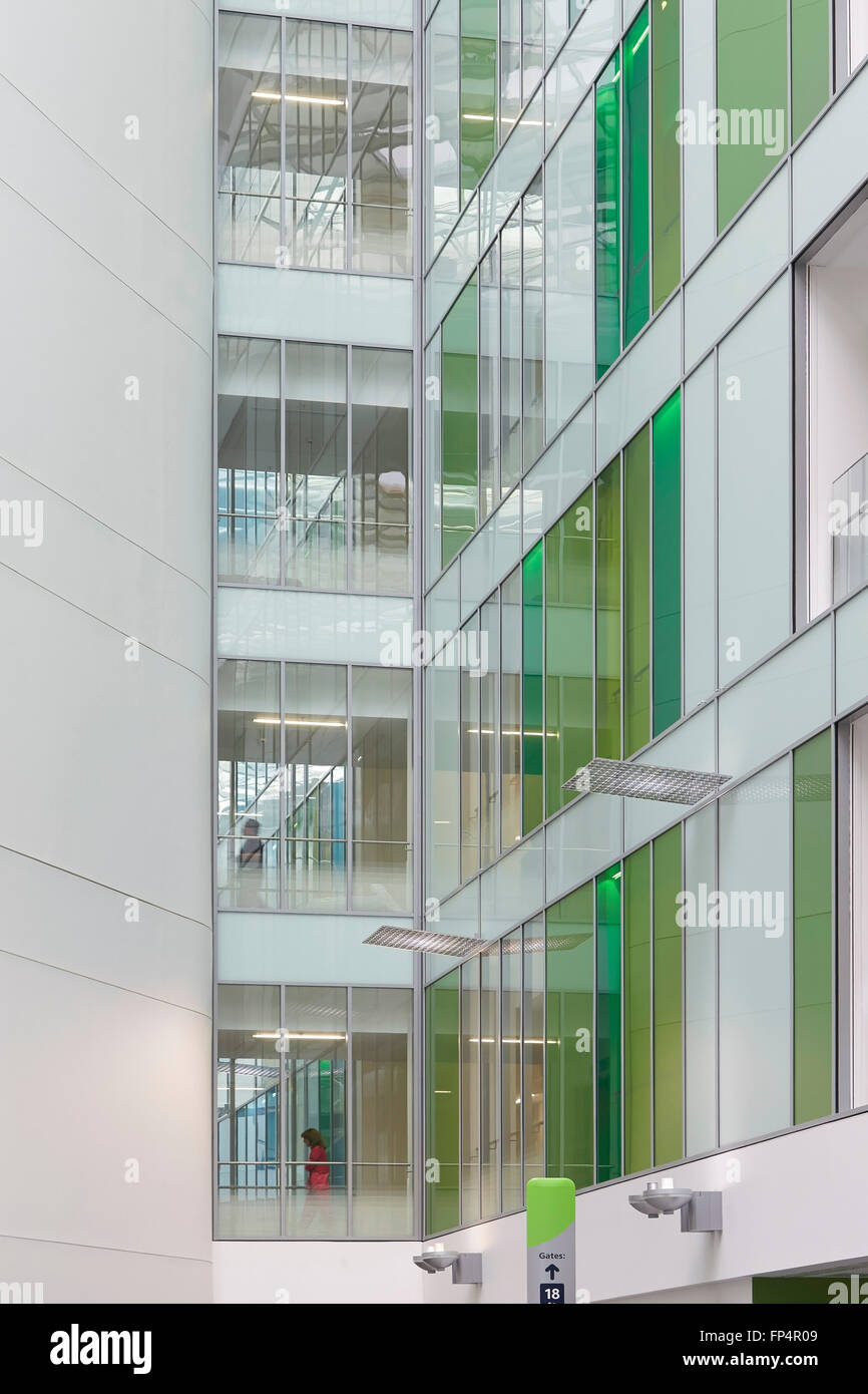 Interior glazing with green colored glass panels. Southmead Hospital ...