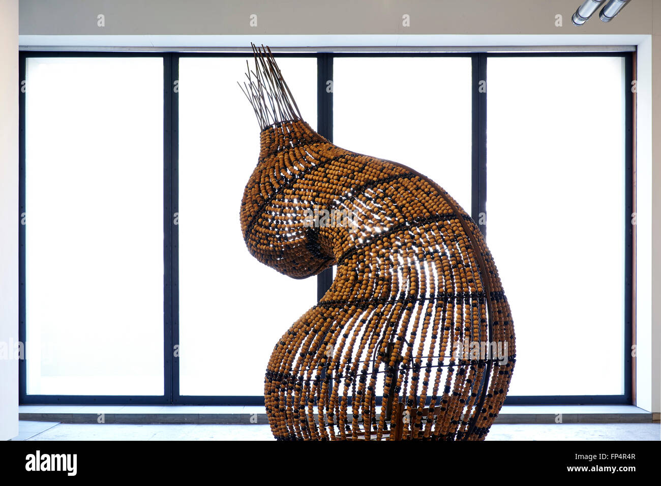 Detail of art work, Cocon du Vide ('Empty Cocoon') against a window ...