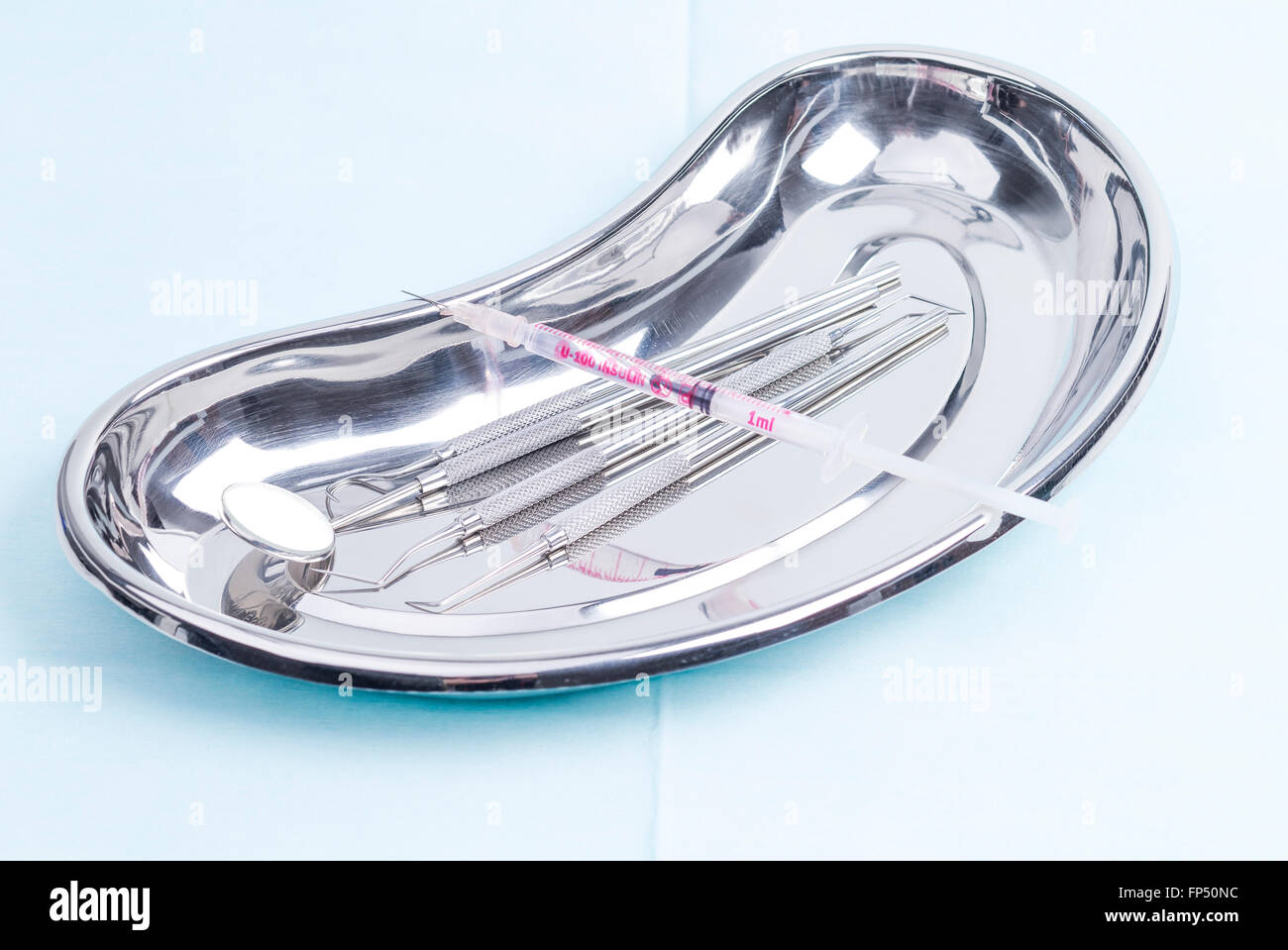 Image shows a set of iron instruments in a metal bowl Stock Photo - Alamy