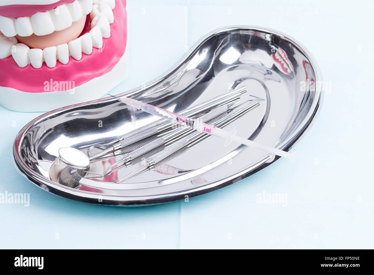 Image shows a set of iron instruments with set of teeth Stock Photo - Alamy