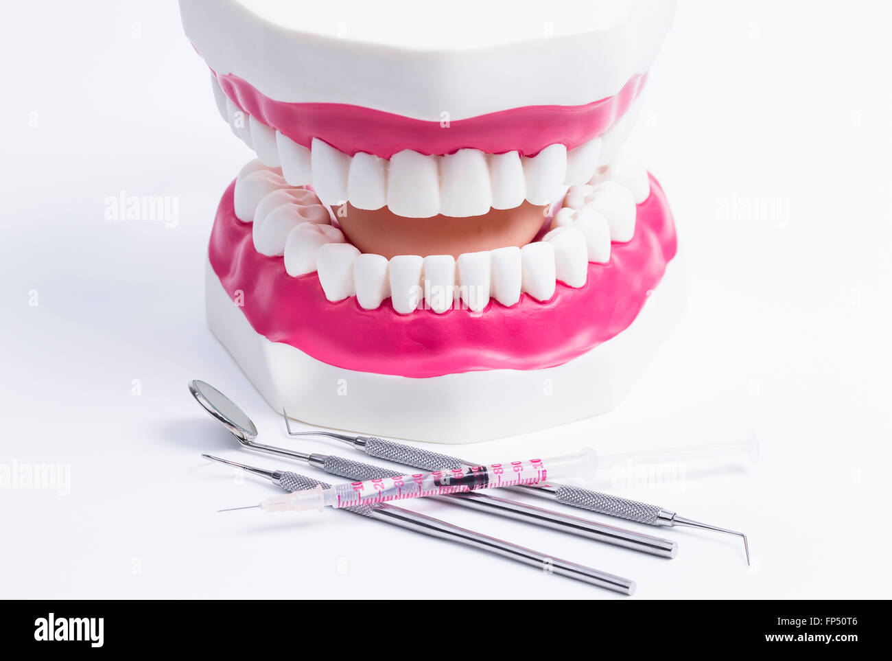 Image shows a set of iron instruments with set of teeth Stock Photo - Alamy