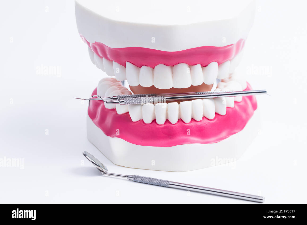 Image shows a set of iron instruments with set of teeth Stock Photo - Alamy