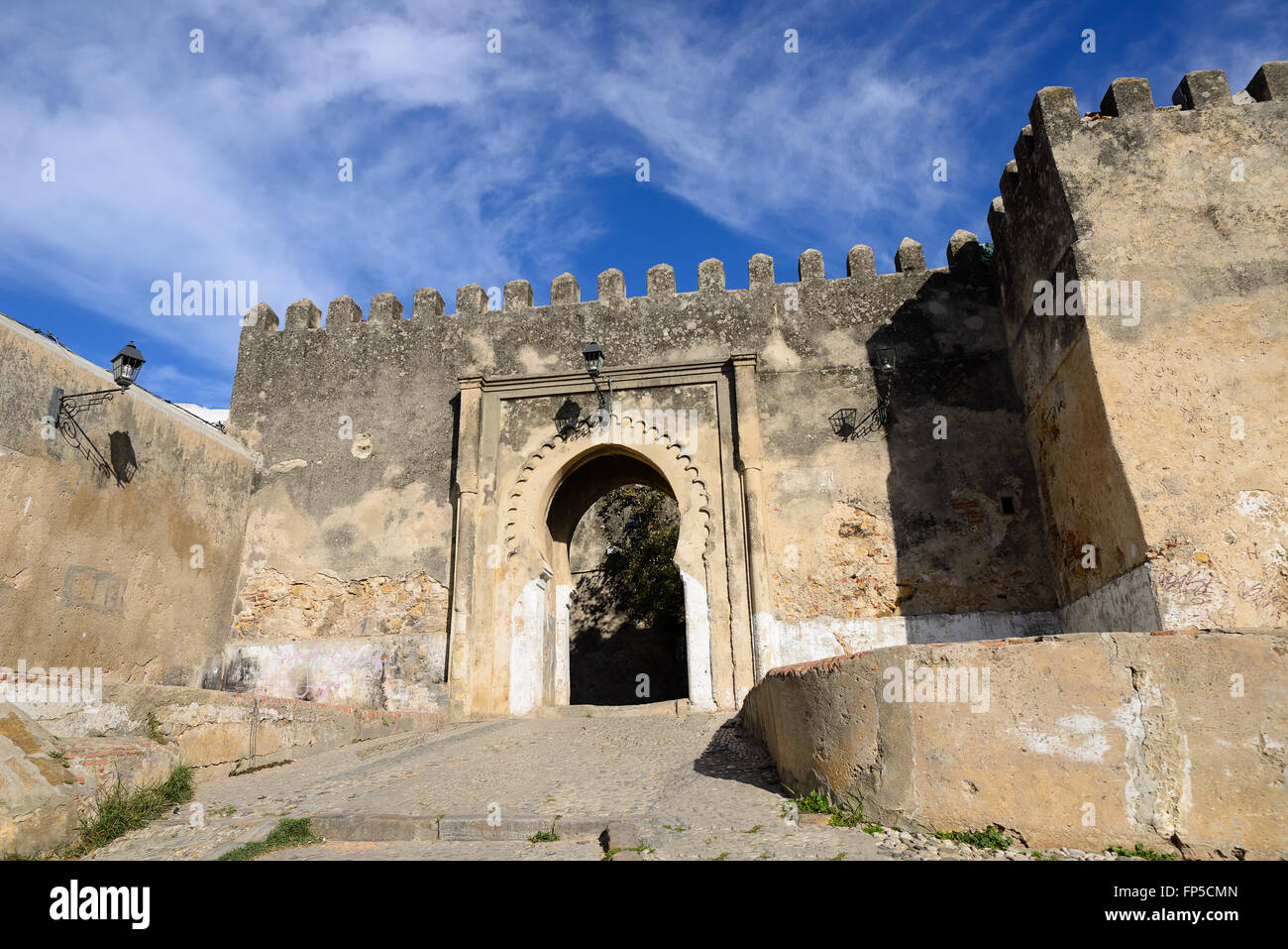 Entrance gate behind ancient walls of the old town (Medina) in Tanger ...