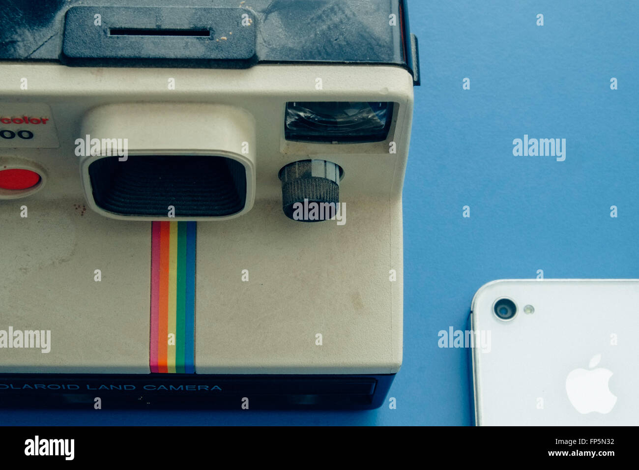 1980s Polaroid film cameras have been replaced by modern smartphones ...