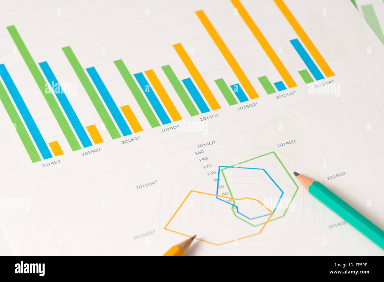 multi color bar and radial charts with two pensils Stock Photo - Alamy