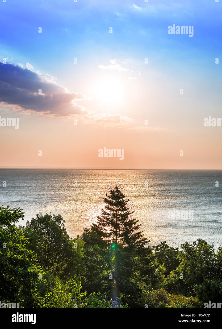 Sunset over water ocean hi-res stock photography and images - Alamy
