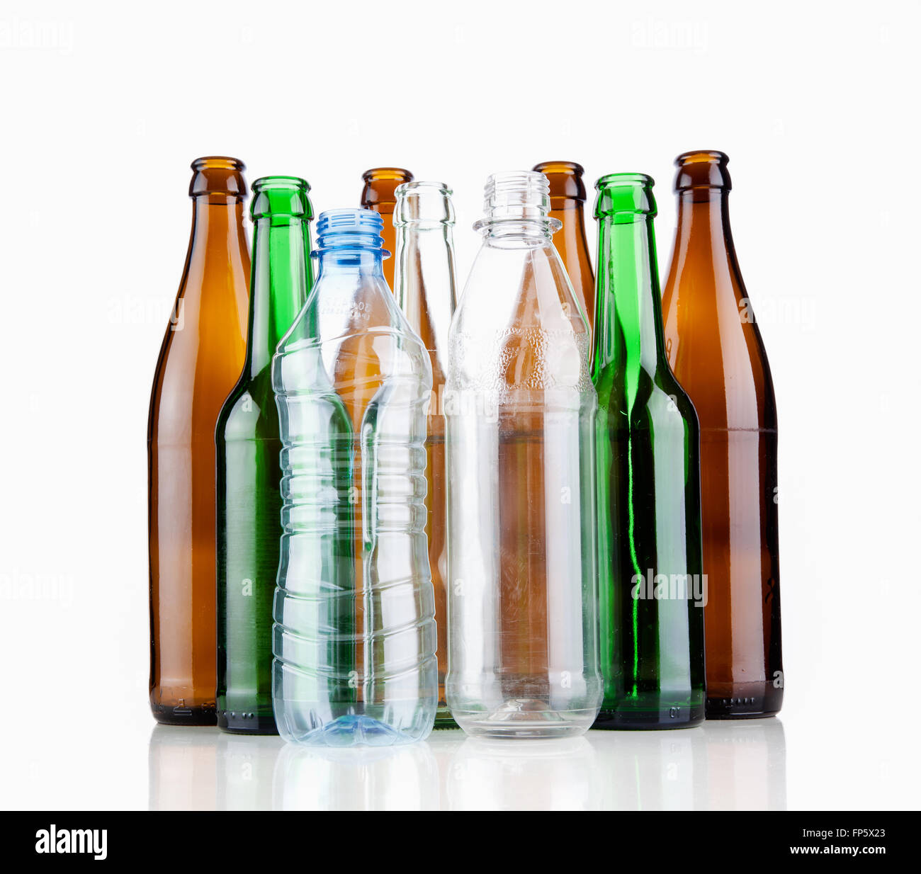 Empty bottles close-up isolated on white background Stock Photo - Alamy