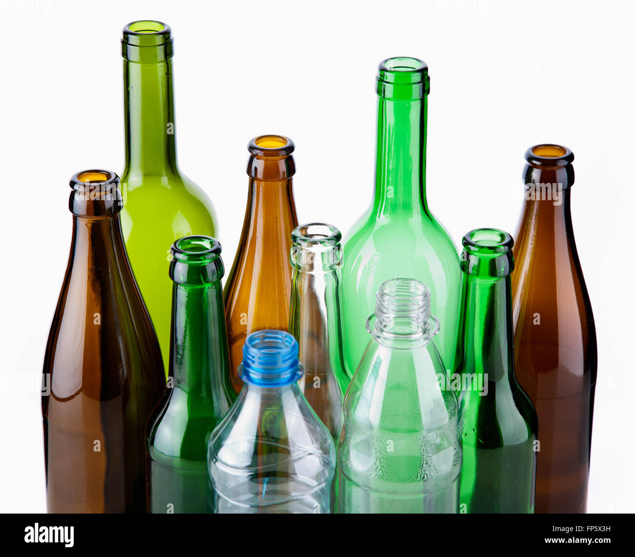 Empty bottles close-up isolated on white background Stock Photo - Alamy