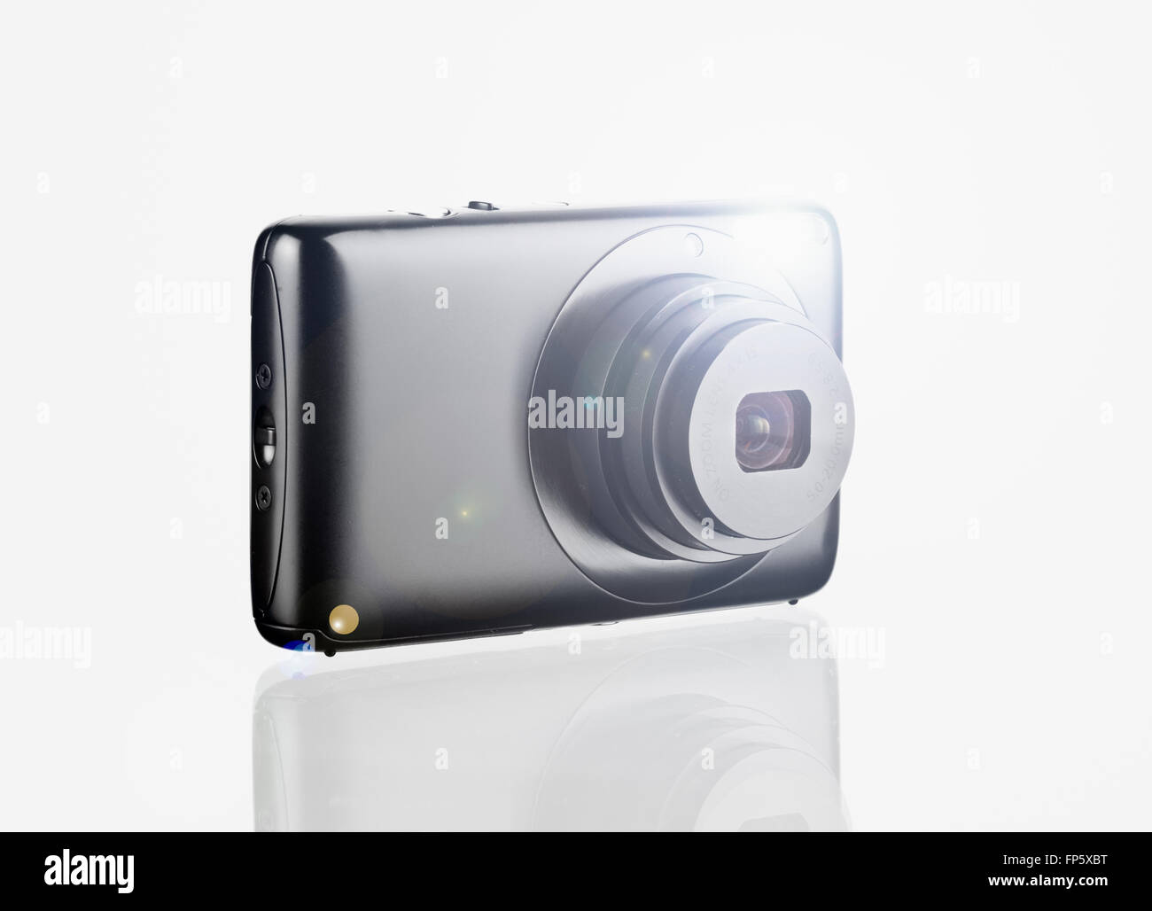 Digital camera isolated on white background Stock Photo - Alamy