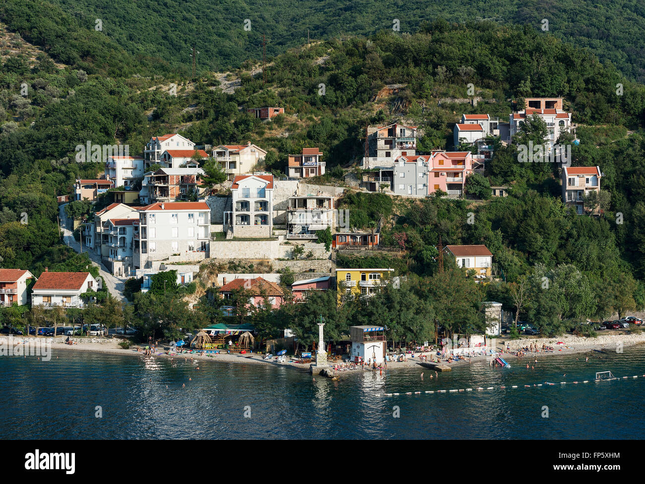 Beach and houses in village of Lepetane, Bay of Kotor, Montenegro Stock ...