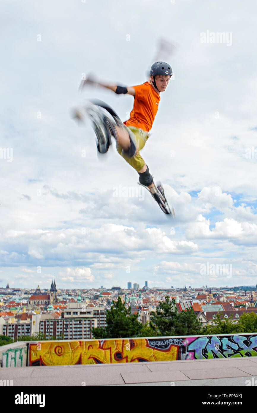 Young guy on a jumping boots Stock Photo - Alamy