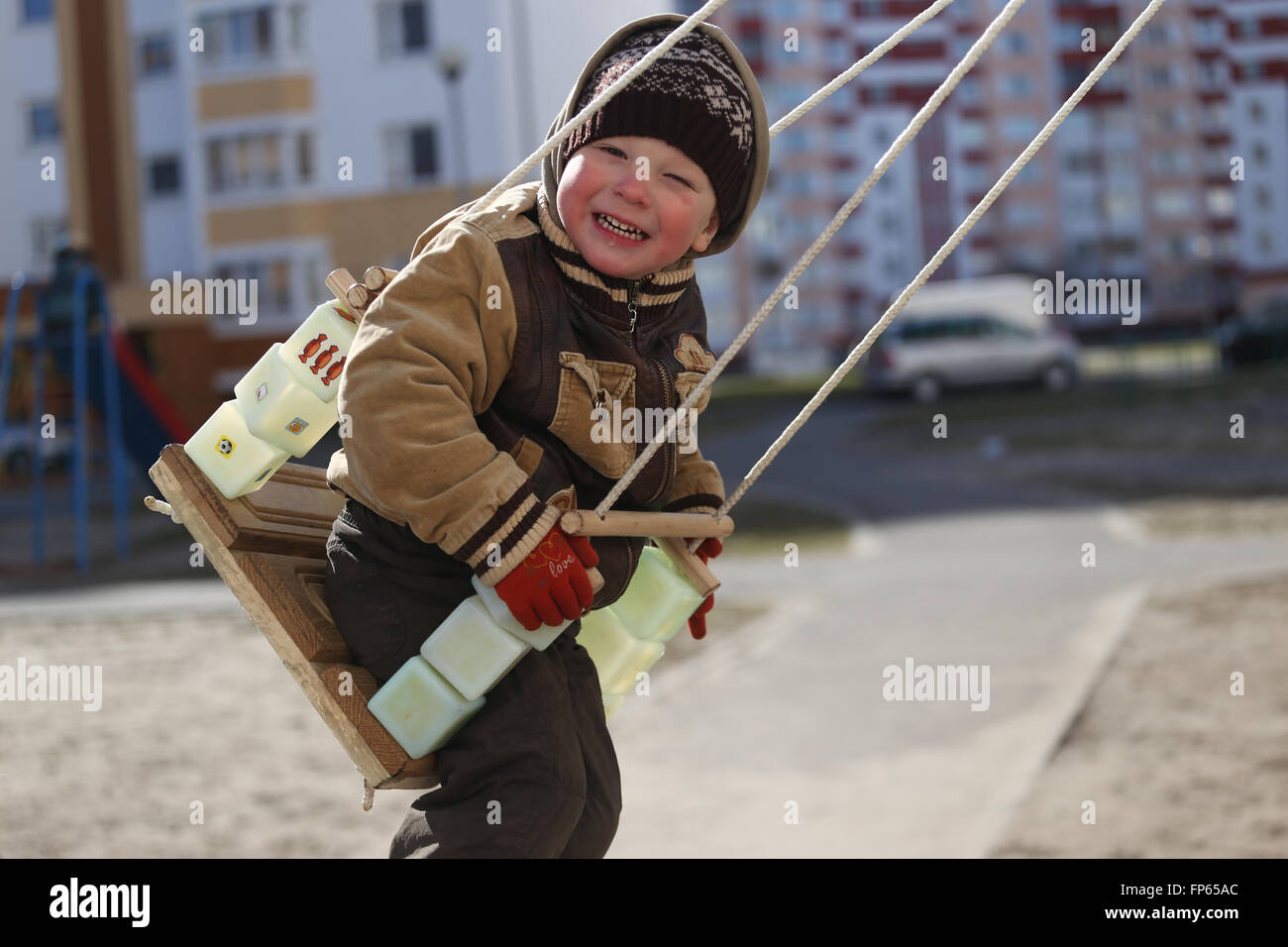 children play on the playground. early spring Stock Photo - Alamy