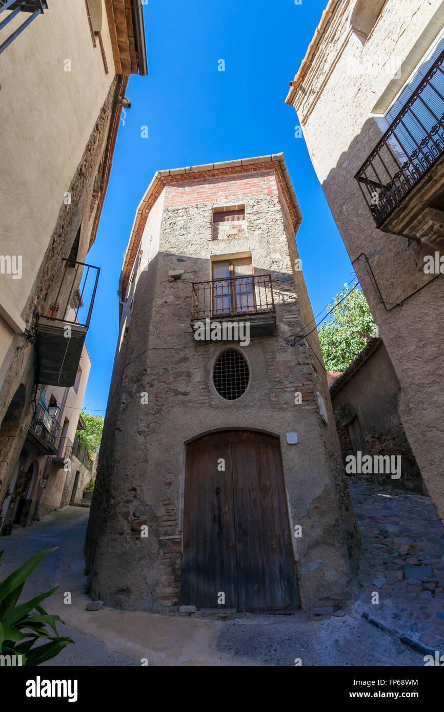 Old buildings in the streets of the old town of Porrera builded with ...