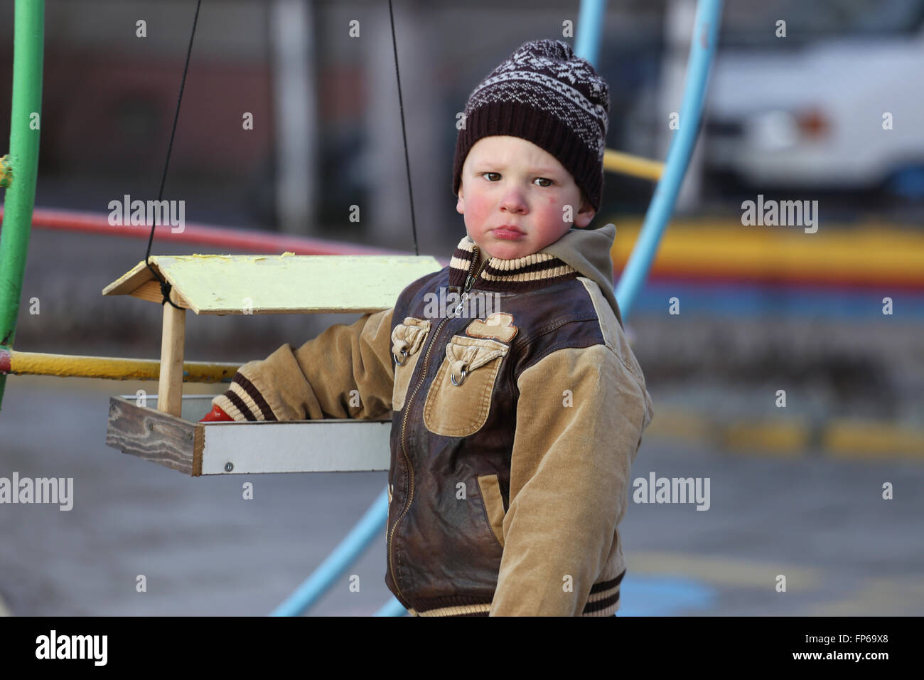children play on the playground. early spring Stock Photo - Alamy