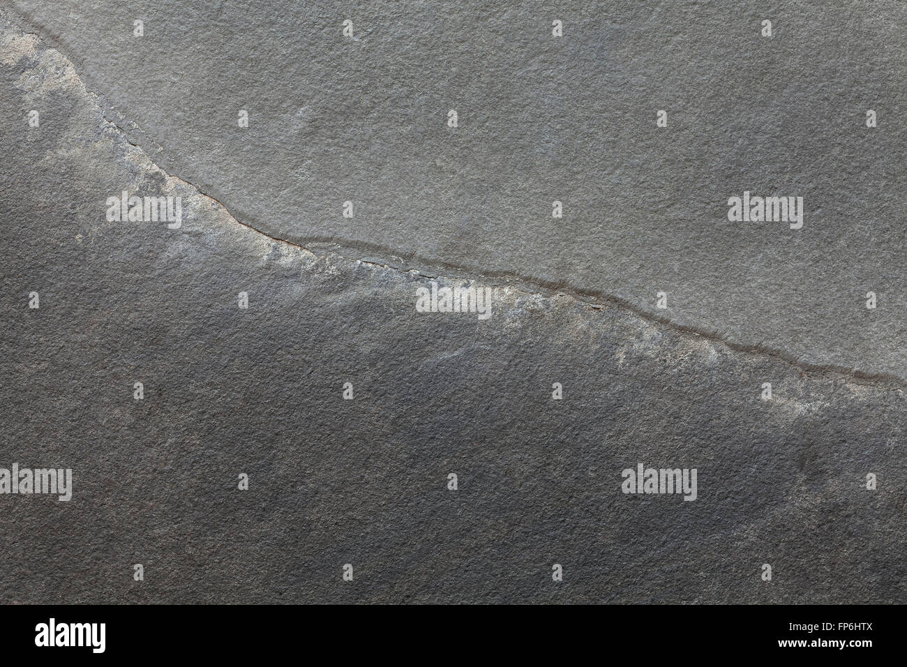 Cracked dark slate, stone background Stock Photo - Alamy